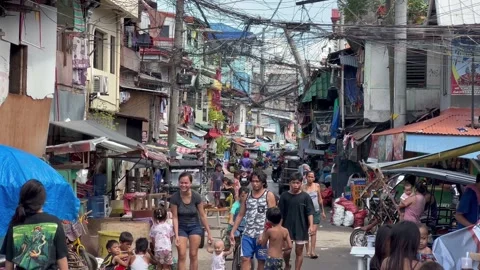 Street within an urban slum area in Cebu... | Stock Video | Pond5