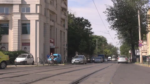 Streetcars and cars on the same street, ... | Stock Video | Pond5