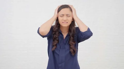 Stressed and tensed Indian girl | Stock Video | Pond5