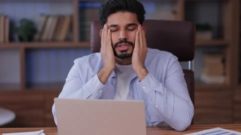 Stressed Arab man At Laptop Touching Hea... | Stock Video | Pond5