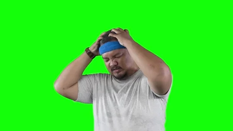 Stressed fat man suffering from headache... | Stock Video | Pond5