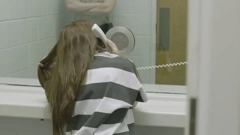 Stressed female inmate with long hair is... | Stock Video | Pond5