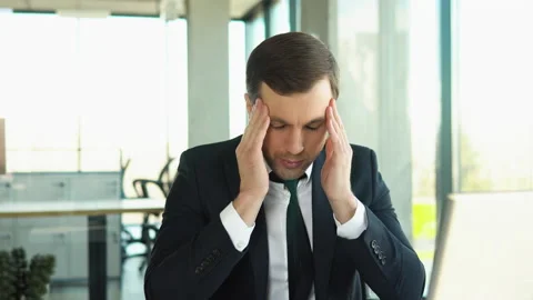 Stressed young man suffering from muscle... | Stock Video | Pond5