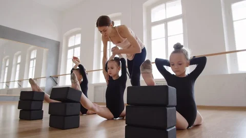 Stretching Exercises in Ballet School | Stock Video | Pond5