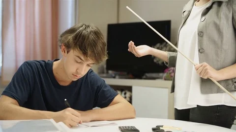 Strict teacher with stick showing mistak... | Stock Video | Pond5