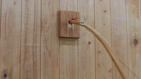Stringing a Japanese yumi bow for kyudo ... | Stock Video | Pond5