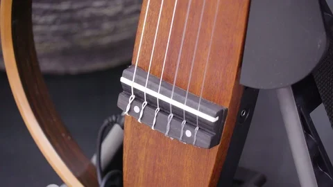 The strings of the Yamaha guitar inside ... | Stock Video | Pond5