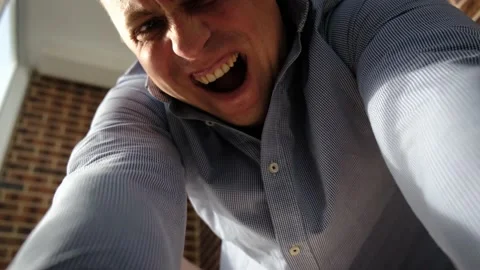 Strong angry man strangling someone in a... | Stock Video | Pond5