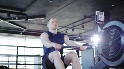 Strongman doing exercise with rope pull ... | Stock Video | Pond5