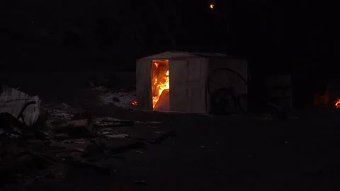 structure fire during large wildfire | Stock Video | Pond5