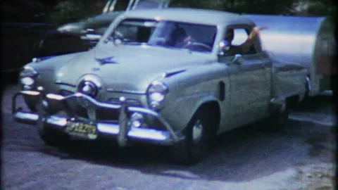 Studebaker pulls the trailer from campin... | Stock Video | Pond5