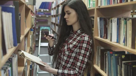 Student Girl Taking Photo of a book page... | Stock Video | Pond5