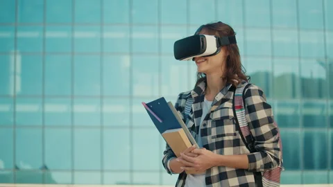 Student Girl Wearing VR Headsets on Back... | Stock Video | Pond5