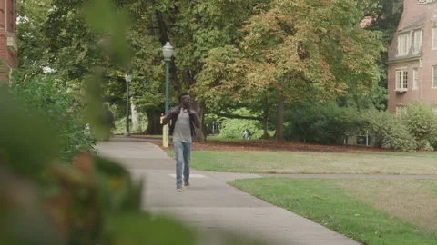 Student Walking Through College Campus | Stock Video | Pond5
