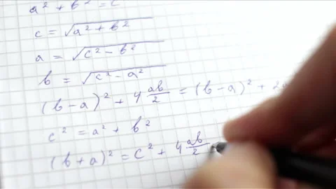 A student writing down math formulas in ... | Stock Video | Pond5