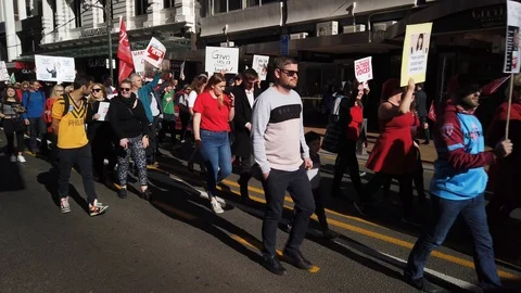 Students and teachers march together hol... | Stock Video | Pond5