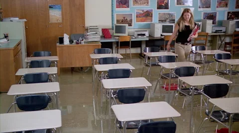 Students coming into classroom as camera... | Stock Video | Pond5