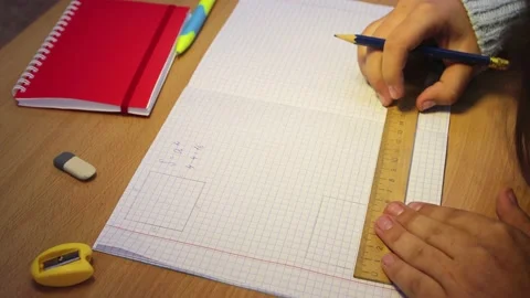 The student's hands draw a rectangle wit... | Stock Video | Pond5