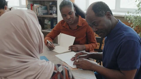 Students Helping Each Other During Lesso... | Stock Video | Pond5