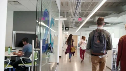 Students leaving study room in modern li... | Stock Video | Pond5