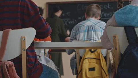 Students Passing Cheat Sheet during Math... | Stock Video | Pond5