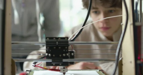 Students printing a prototype using a 3D... | Stock Video | Pond5