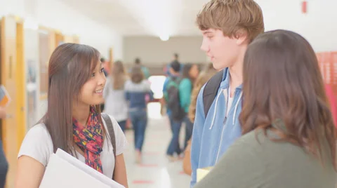 Students talk to each other in the hallw... | Stock Video | Pond5