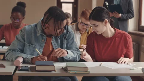 Students Using Cheat Sheet in Class | Stock Video | Pond5