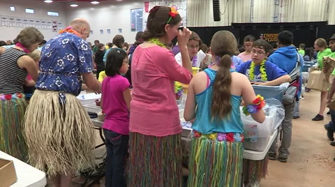 Students Volunteers pack charity food ai... | Stock Video | Pond5
