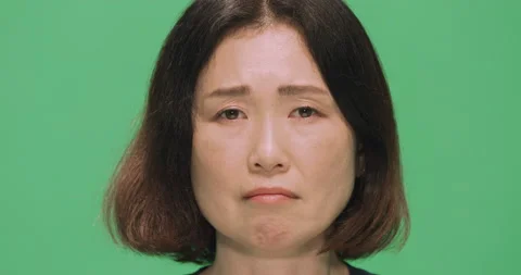 Studio, a portrait of a sad Japanese wom... | Stock Video | Pond5