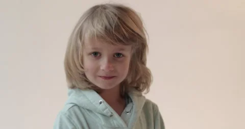 Studio portrait of a smiling handsome bo... | Stock Video | Pond5