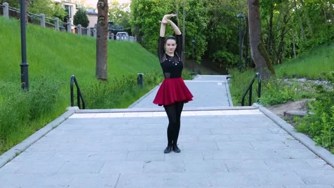 Stunning female dancer dances outside in... | Stock Video | Pond5