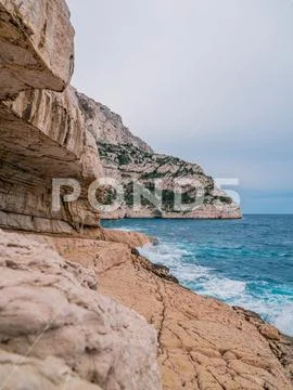 Photograph: Stunning limestone formations and azure waters in Calanques ...
