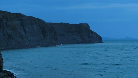 Stunning seascape with a steep cliff on ... | Stock Video | Pond5
