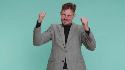 Stylish business man shouting, raising f... | Stock Video | Pond5