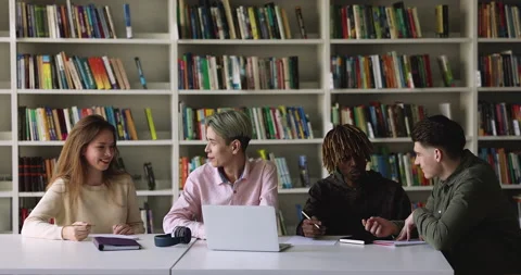 Stylish young students working in pairs ... | Stock Video | Pond5