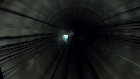 Subway train moving fast at dark tunnel.... | Stock Video | Pond5