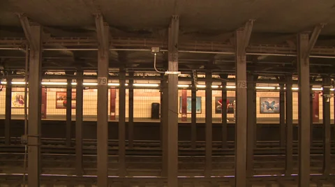 Subway train runs trough empty station -... | Stock Video | Pond5