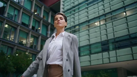 Successful ceo walking downtown street. ... | Stock Video | Pond5