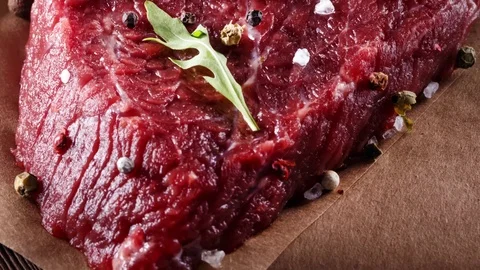 Succulent tender raw lean beef steaks ly... | Stock Video | Pond5