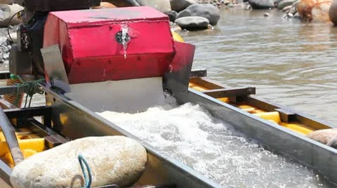 Suction dredge mining placer gold deposi... | Stock Video | Pond5