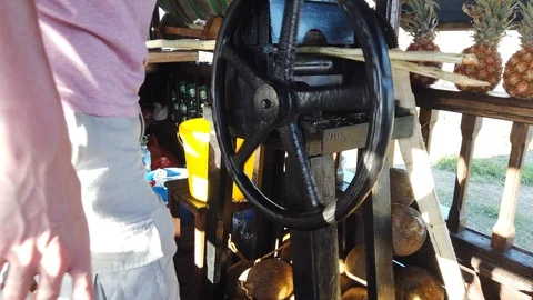 Sugar cane squeezing machine. Man squeez... | Stock Video | Pond5