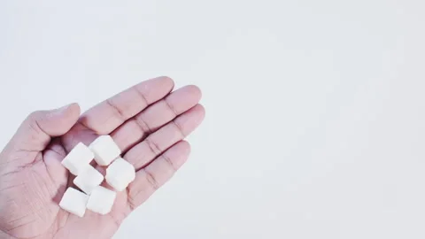 Sugar Cubes In a Hand | Stock Video | Pond5
