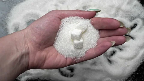 Sugar in a Woman's Hand as a Symbol of H... | Stock Video | Pond5