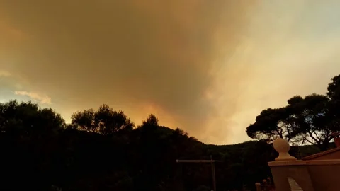 sun completely covered by a column of sm... | Stock Video | Pond5