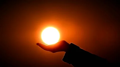 Sun On Hand - Silhouette Of Hand Holding... | Stock Video | Pond5