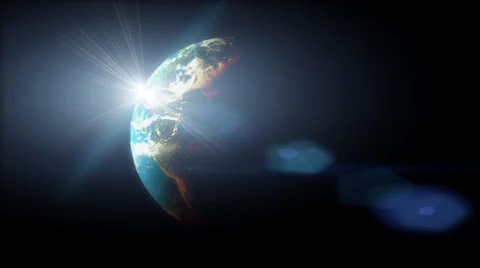 Sun lens flare over the rotating planet ... | Stock Video | Pond5