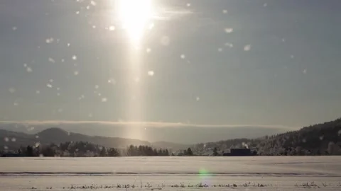 A sun pillar appears over an idyllic sno... | Stock Video | Pond5
