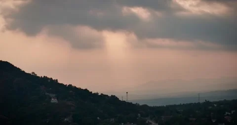 Sun rays falling on the slope of the mou... | Stock Video | Pond5