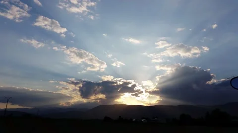 sun rays rise big sky evening clouds | Stock Video | Pond5